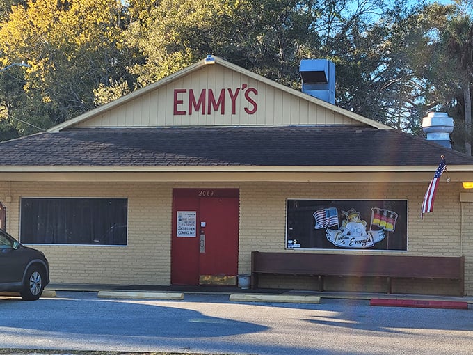 Emmy's Time Out Tavern's bright yellow exterior stands as a beacon for comfort food lovers. That classic sign has guided hungry DeLand locals for generations!