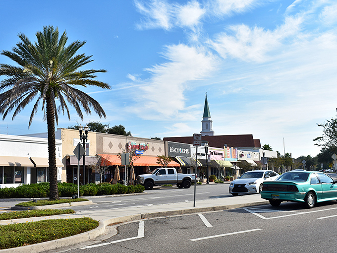 Downtown Jacksonville blends old and new, with palm trees and storefronts creating a distinctly Florida urban landscape.