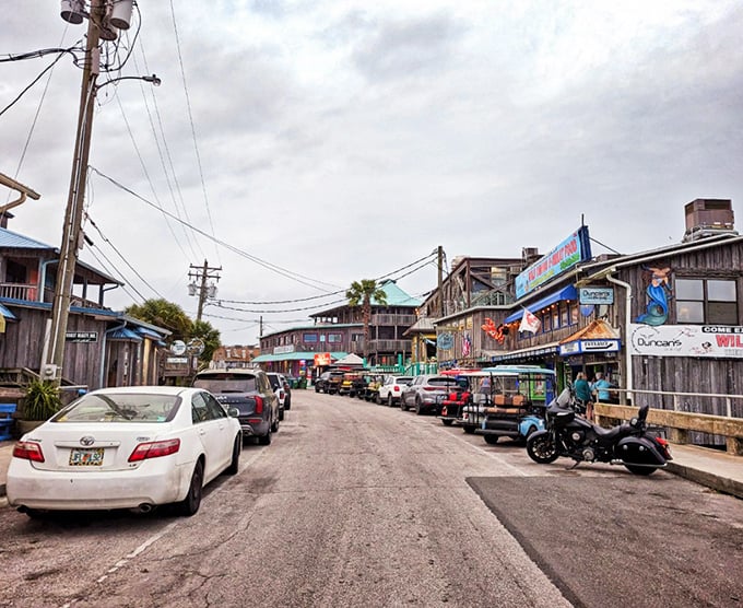 The rustic wooden buildings of Cedar Key's main street transport visitors back to a simpler time in this laid-back island community.