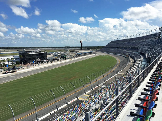 Those steep banking turns look impossible to drive on, but race car drivers zoom around them like it's just another Tuesday.