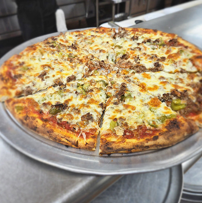 Pizza perfection in every slice! Melty cheese blankets savory ground beef and green peppers on a crust with that ideal balance of crisp and chew.