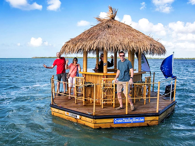 Paradise found! Guests enjoy the unique experience of cruising on a thatched-roof tiki boat, creating memories that will last long after the waves settle.