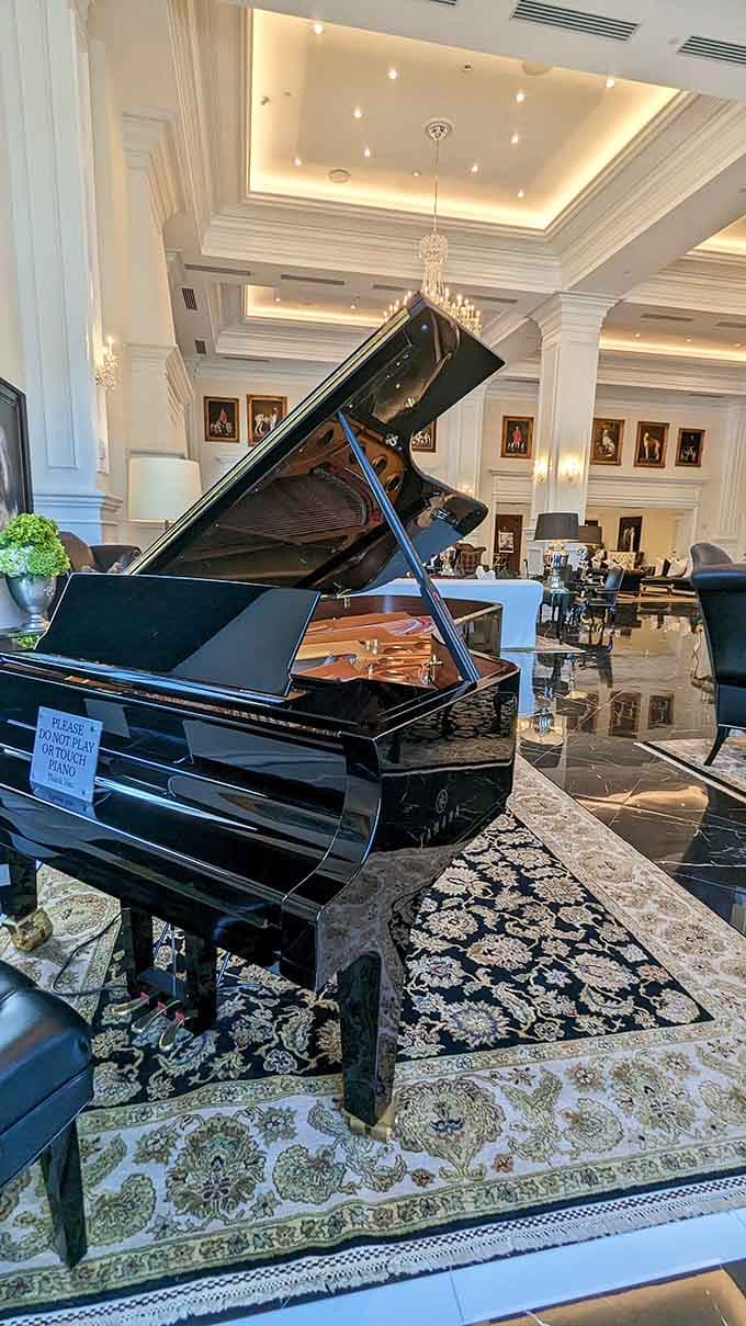 That grand piano isn't just for show, it's the centerpiece of a lobby so elegant, you'll feel underdressed in anything less than your Sunday best.