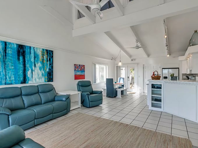 Coastal elegance meets comfort in this airy living space where ocean views steal the show.