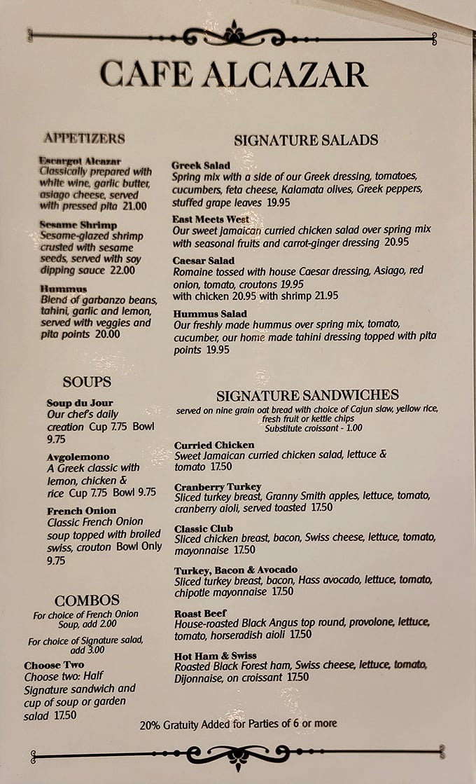A menu that would make Poseidon himself surface for lunch—escargot in a former swimming pool feels poetically appropriate.