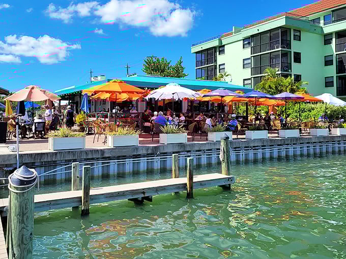 Colorful umbrellas dot this waterfront restaurant patio where seafood tastes fresher when your toes could practically touch the water.
