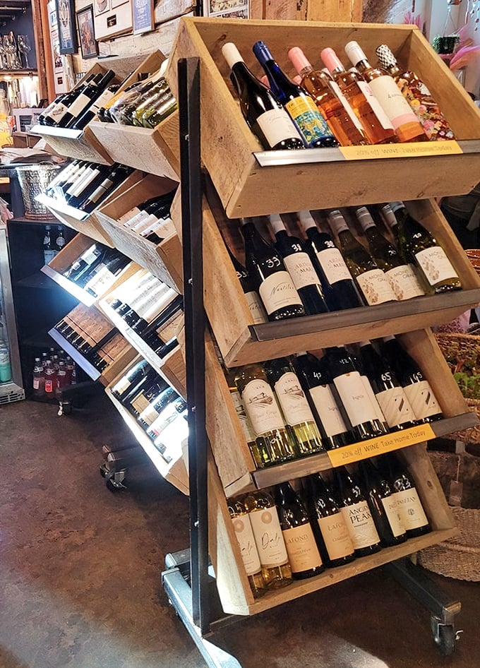 Wine enthusiasts rejoice! These wooden racks showcase bottles that tell stories of terroir and tradition, waiting to accompany your next meal.