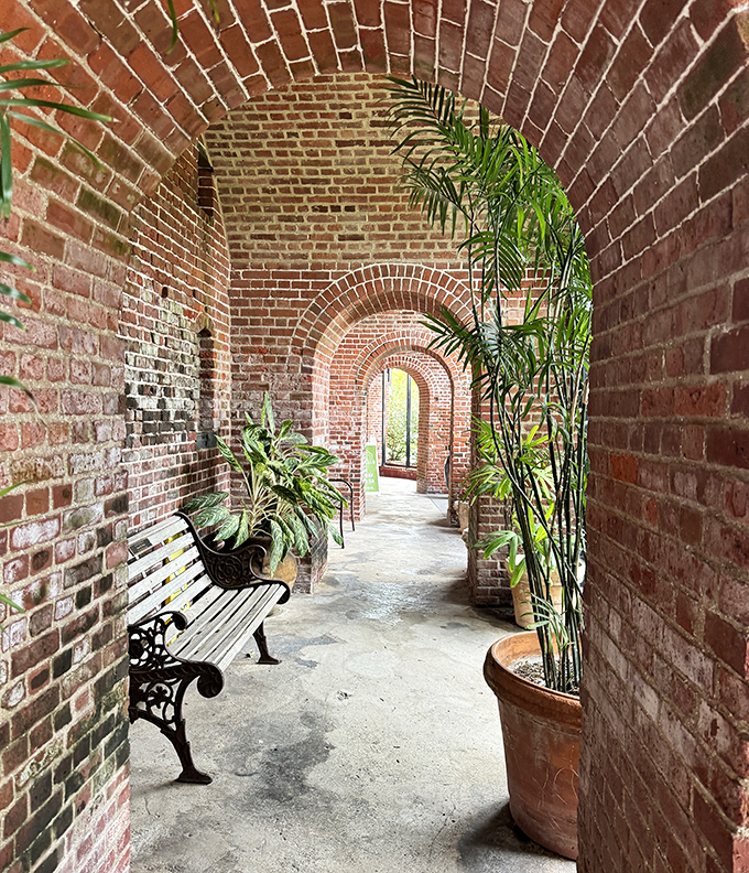 Time stands still in these brick passageways, where history whispers through arches draped in living greenery.