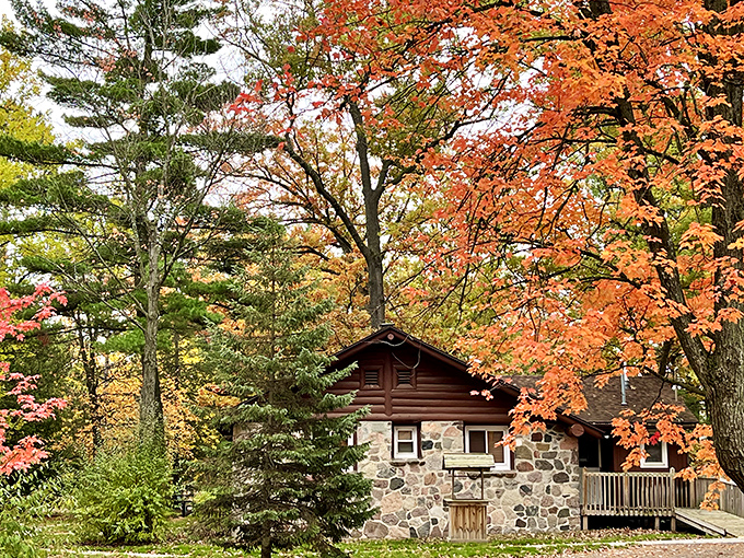 Fall's fiery display transforms this rustic cabin into a postcard-perfect scene &ndash; Mother Nature showing off her best color palette.