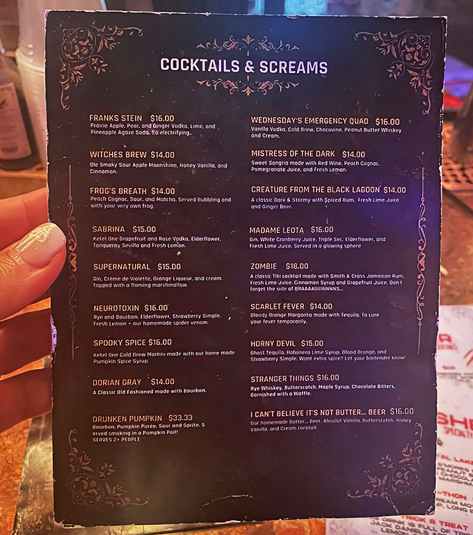 The cocktail menu features creative concoctions with names inspired by classic horror films and characters, each crafted with theatrical presentation.