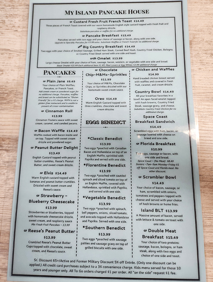 The menu reads like a fantasy novel where pancakes are the heroes – from Elvis-inspired creations to chocolate chip wonders that make mornings worth waking up for.