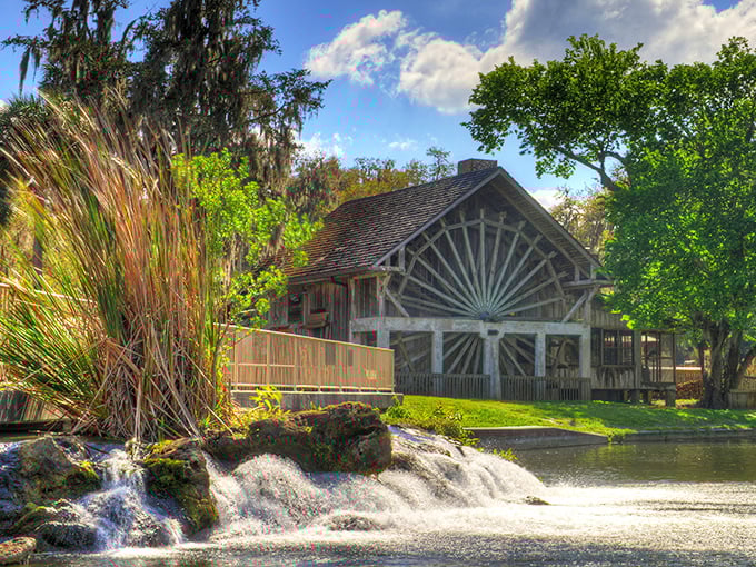 The historic water wheel at De Le&oacute;n Springs powers the old sugar mill, now a pancake restaurant where visitors flip their own breakfast beside crystal-clear waters.