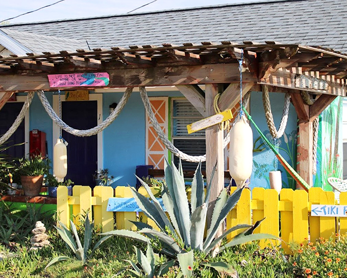 Bright colors and island vibes welcome guests to Si Como No Inn, where hammocks sway in invitation.