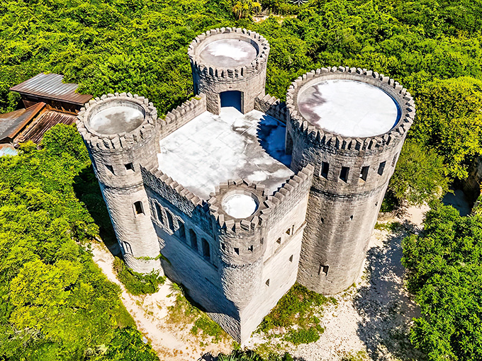 This aerial view reveals Castle Otttis in all its stone glory, a handcrafted tribute to ancient Irish architecture that seems to guard secrets within its thick walls.