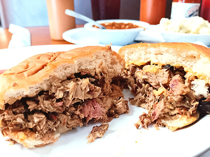 The legendary chopped pork sandwich &ndash; where smoke-kissed meat meets tangy sauce in a romance that's been making taste buds swoon since the 1950s.