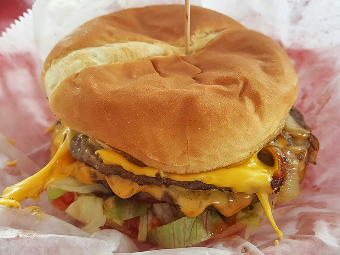 Not just any cheeseburger &ndash; this beauty sports the perfectly toasted bun that's The Burger Inn's signature move, catching every precious drop of flavor.