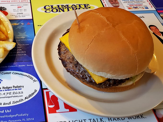 Behold the star of the show &ndash; a perfectly proportioned cheeseburger that proves simplicity, when done right, is culinary genius.