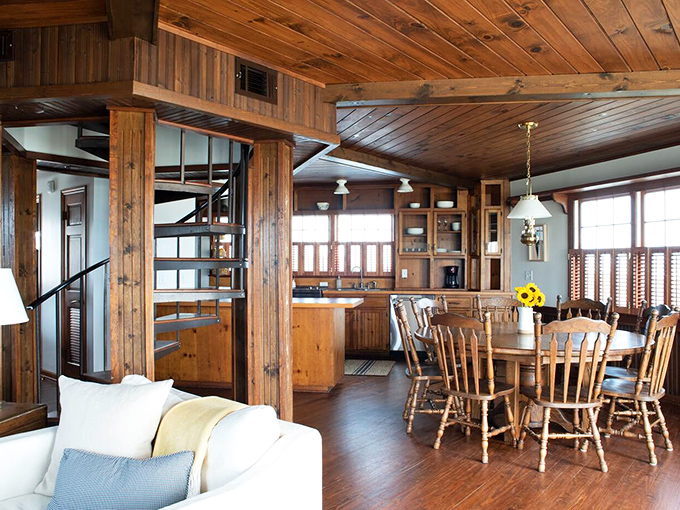 The dining area's round wooden table has witnessed countless family feasts, competitive board games, and plans for the next day's adventures.
