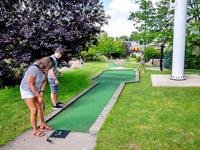 Mini golf: Landscaped challenges await putters of all skill levels, where family rivalries blossom over deceptively simple-looking holes.