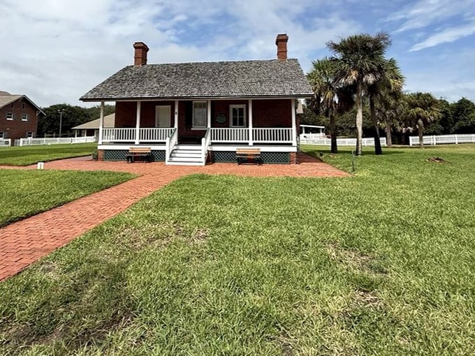 This charming keeper's cottage once housed the guardians of the light, its simple design belying the critical role its occupants played in maritime safety.