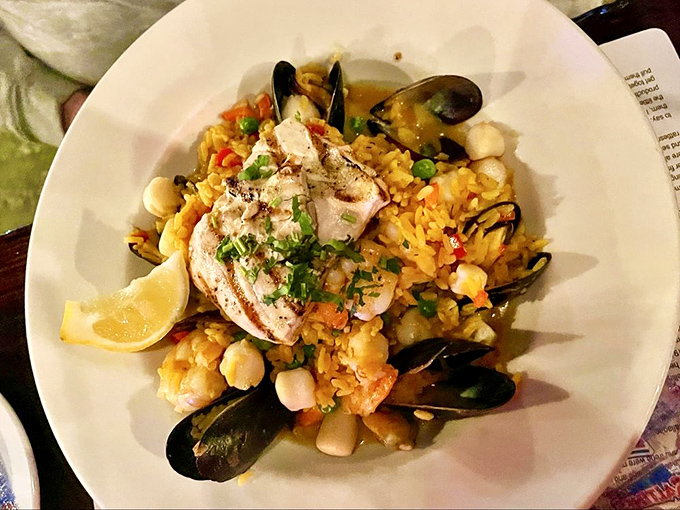 Walt's Paella &ndash; where seafood throws the party of the year atop saffron rice. Those mussels didn't dress up for nothing!
