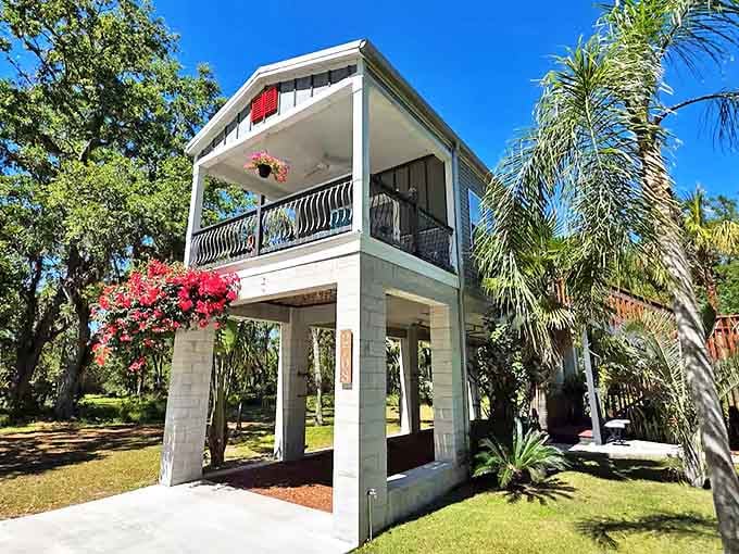 Architectural ingenuity meets pastoral charm in this elevated abode, where vibrant bougainvillea adds splashes of color to the pristine exterior.