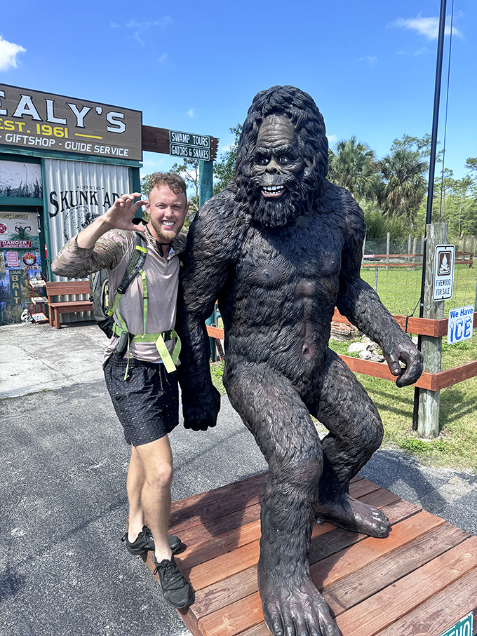 Making friends with Florida's folklore! The infamous Skunk Ape statue welcomes visitors with a grin that's equal parts menacing and mischievous.