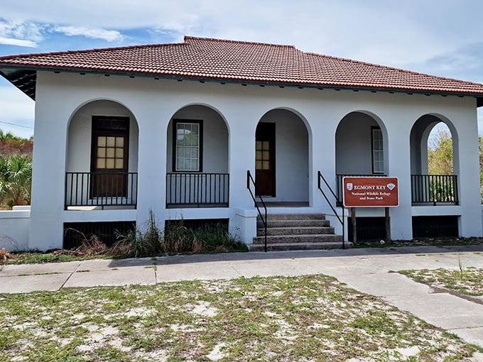 This Spanish-style building once housed military personnel, now stands as a silent witness to Egmont Key's strategic past.