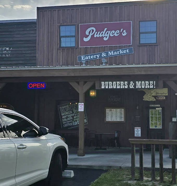 Pudgee's rustic wooden exterior might not win architectural awards, but locals know it's where burger magic happens in Floral City.