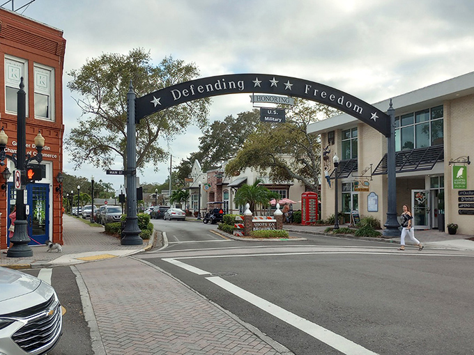 Dunedin's downtown welcomes visitors with its "Defending Freedom" arch, a gateway to streets where Scottish heritage meets Florida sunshine.