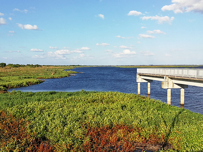 Lake Okeechobee stretches to the horizon like an inland sea, its vastness only matched by the big Florida sky above.