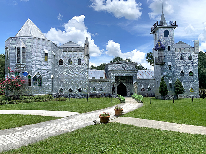 Solomon's Castle gleams like a knight's silver armor in the Florida sunshine, its walls covered in repurposed printing plates creating a truly one-of-a-kind artistic vision.