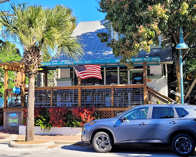 Third Wave Cafe's charming exterior promises culinary adventures inside, with the American flag proudly waving hello.