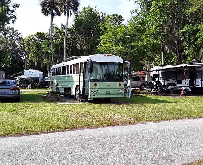 Converted buses and creative camping setups show that adventure comes in all shapes and sizes at this unique spot.