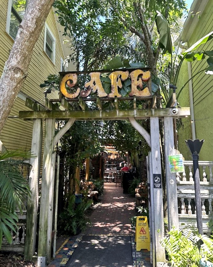 Hidden between buildings, this secret garden cafe entrance leads to morning feasts worth waking up early for.