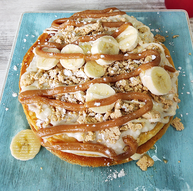 Banana pancakes with crumbles and caramel sauce – proof that bananas have always been destined for greater things than simply being eaten straight from the peel.