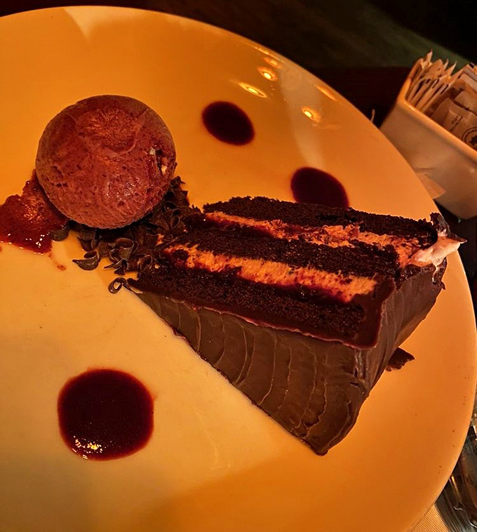 Layers of chocolate cake and frosting stack up like a delicious Jenga tower, except you definitely want this one to fall into your mouth.