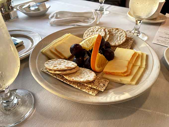 The cheese plate arrives like evidence in a gourmet crime scene &ndash; perfectly arranged and begging for thorough investigation.