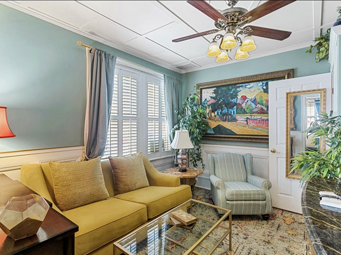 Cozy Sitting Room: Sink into this seafoam sanctuary where you can curl up with a good book or perhaps an impromptu conversation with a visitor from the past.