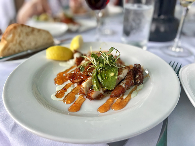 This isn't just seafood&mdash;it's a Key West autobiography on a plate. The sauce artfully painted beneath could hang in a gallery.