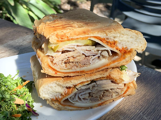 The Cuban sandwich arrives like a postcard from Havana &ndash; layers of savory goodness pressed between bread that crackles with each heavenly bite.