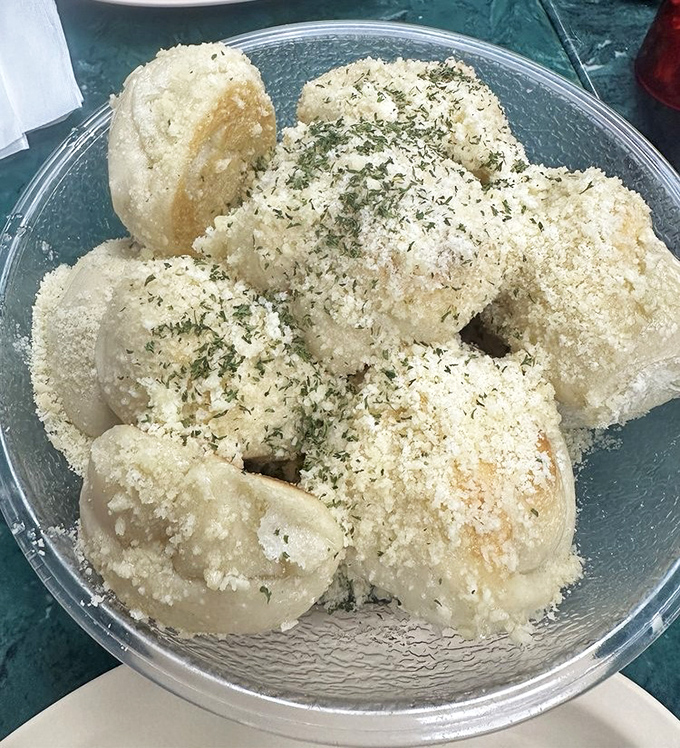 These aren't just bread with garlic&mdash;they're pillowy clouds of dough baptized in parmesan and herbs, waiting to change your life.