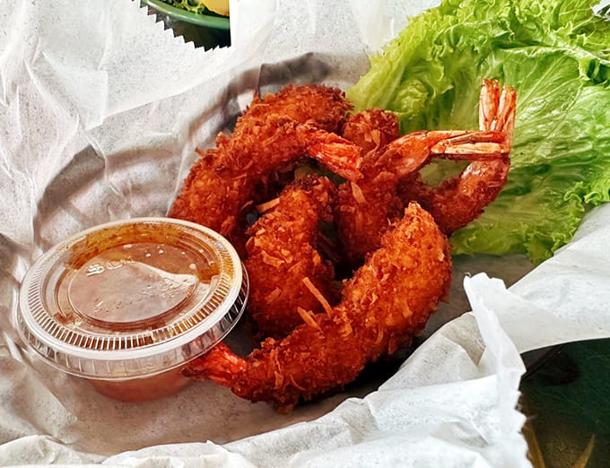 Golden coconut shrimp that crunch like autumn leaves but taste infinitely better, especially with that dipping sauce.