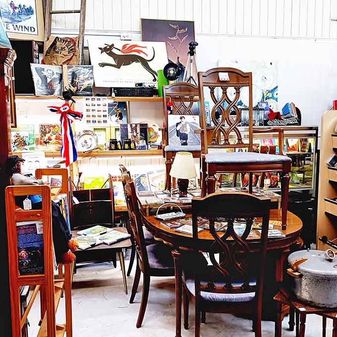 Dining chairs with personality gather around a vintage table, like old friends waiting for their next dinner party conversation.