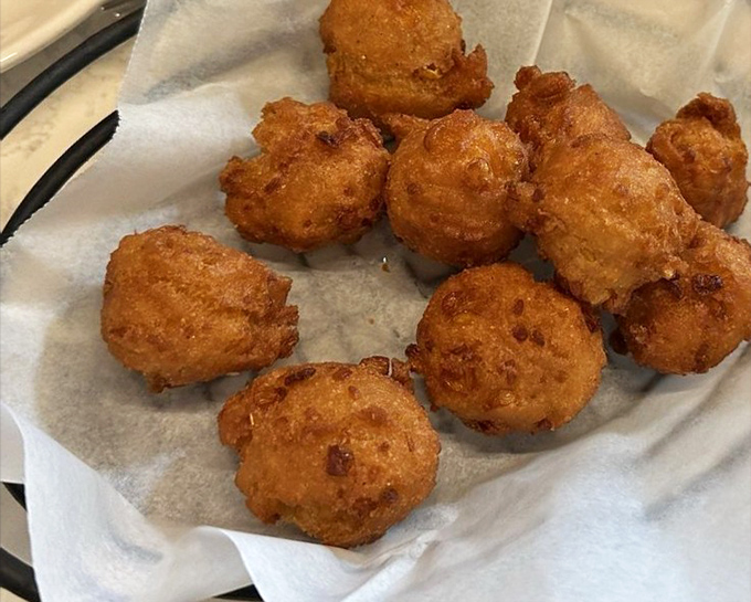 Golden-brown hush puppies with a perfectly crispy exterior and tender interior &ndash; these addictive cornmeal delights rarely survive the first five minutes at any table.