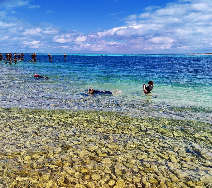 The water is so clear you can count the pebbles on the bottom while floating in what feels like liquid glass.
