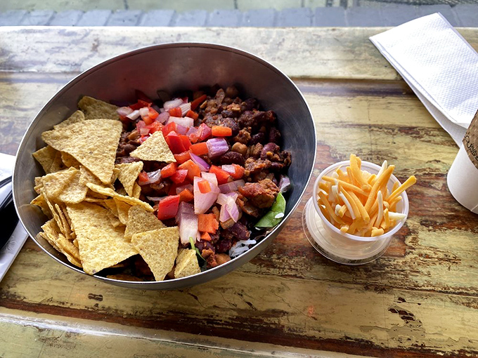 This vegetarian bowl isn't just healthy eating &ndash; it's a colorful celebration featuring avocado, black beans, and enough toppings to keep your fork excited.