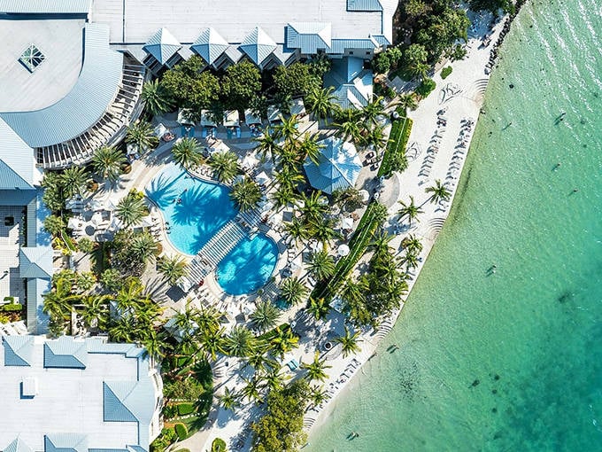 Paradise found! Playa Largo Resort's beachfront pools seamlessly blend into the turquoise Keys waters, creating an infinity effect that soothes the soul.