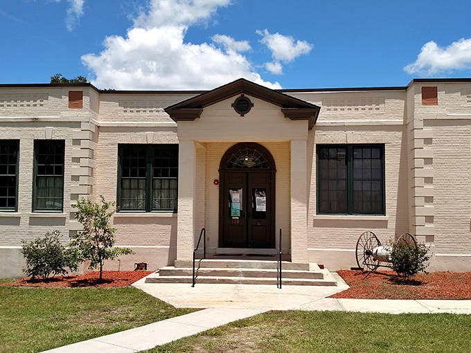 The historic High Springs Museum building welcomes visitors with its classic architecture and well-maintained grounds.