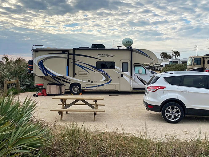 Wooden chairs overlooking a serene waterway &ndash; at Gamble Rogers, the morning coffee view beats any five-star hotel balcony.